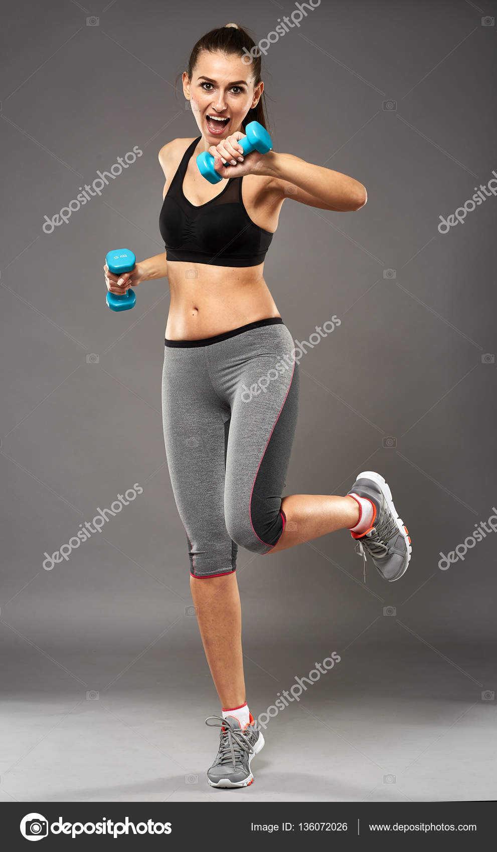 Fitness model posing Stock Photo by ©Xalanx 136072026