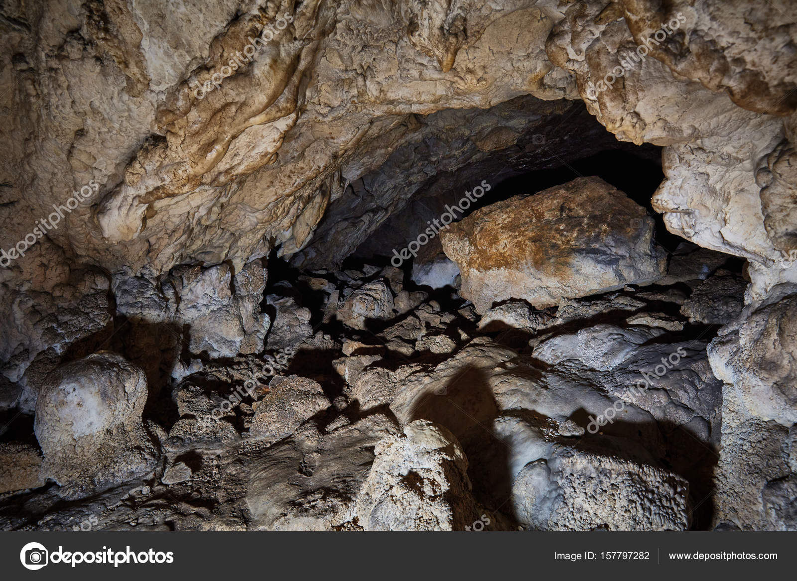 Cave in a limestone mountain — Stock Photo © Xalanx #157797282