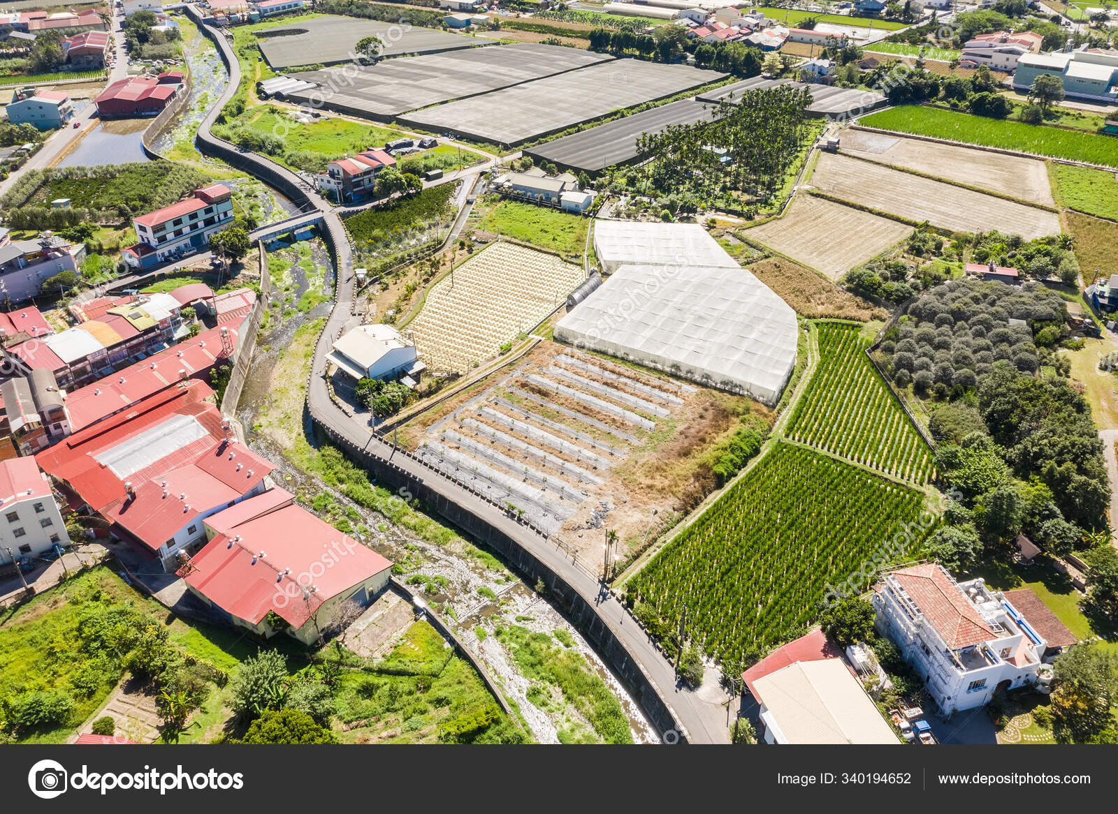 Aerial view of Puli town with buildings and farms — Stock Editorial ...