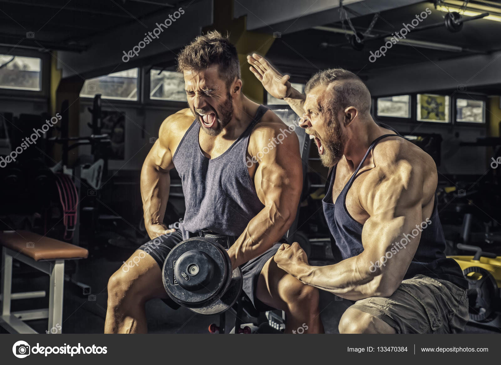 Two men working out in gym — Stock Photo © magann #133470384