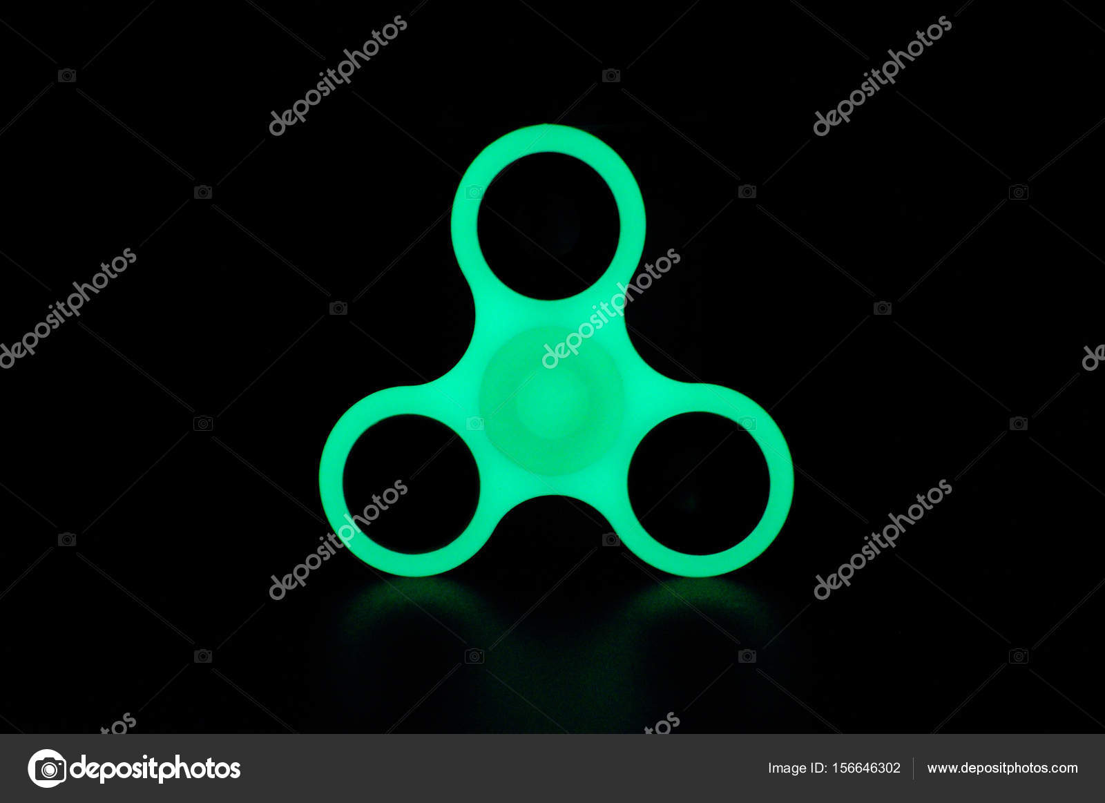 Glowing in the dark fidget spinner Stock Photo by ©elly_l 156646302