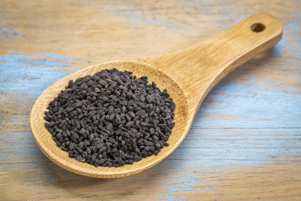 Black cumin seeds — Stock Photo © PixelsAway #126113804