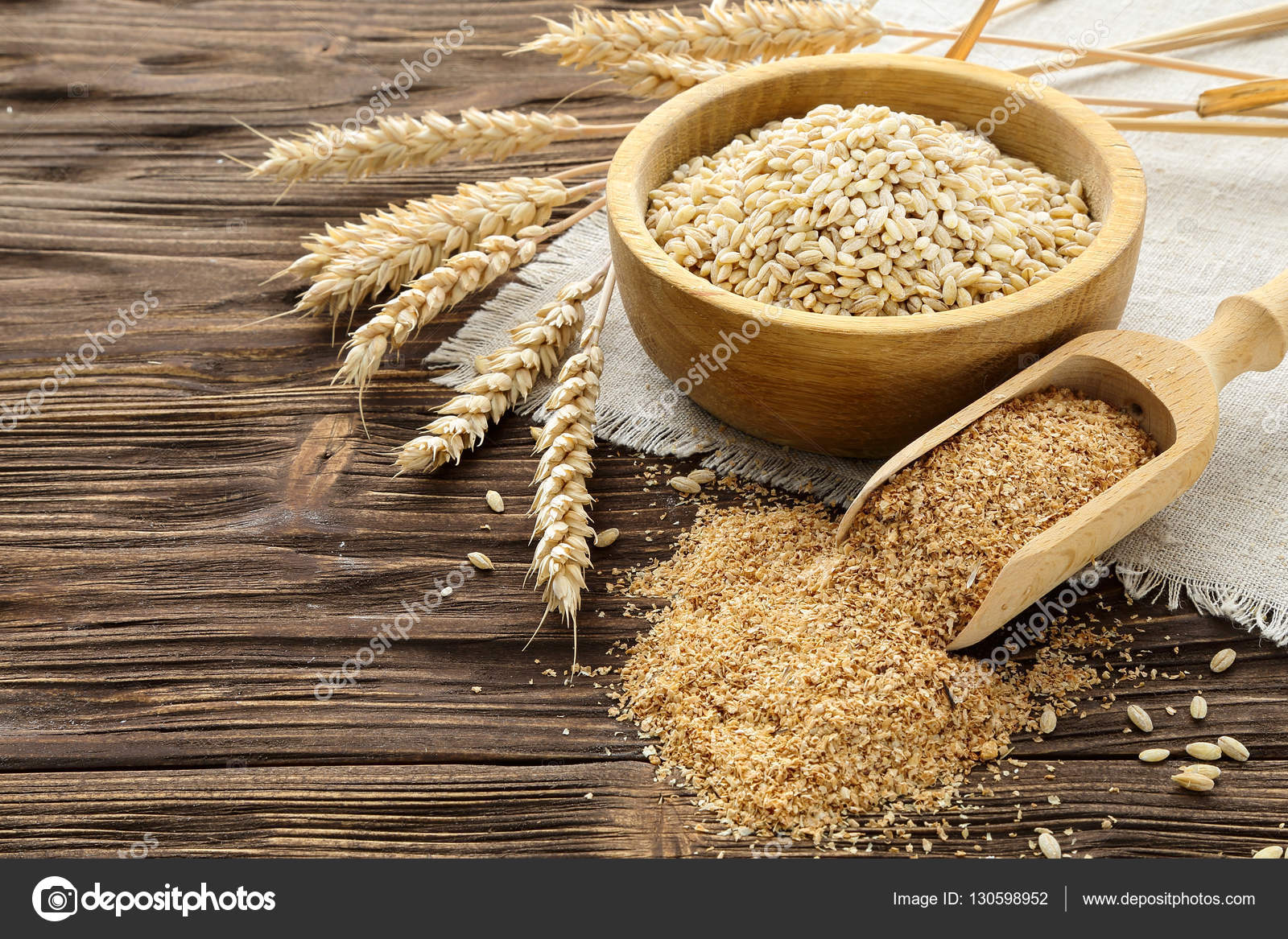 Bran, grain and wheat ears Stock Photo by ©Ferumov 130598952