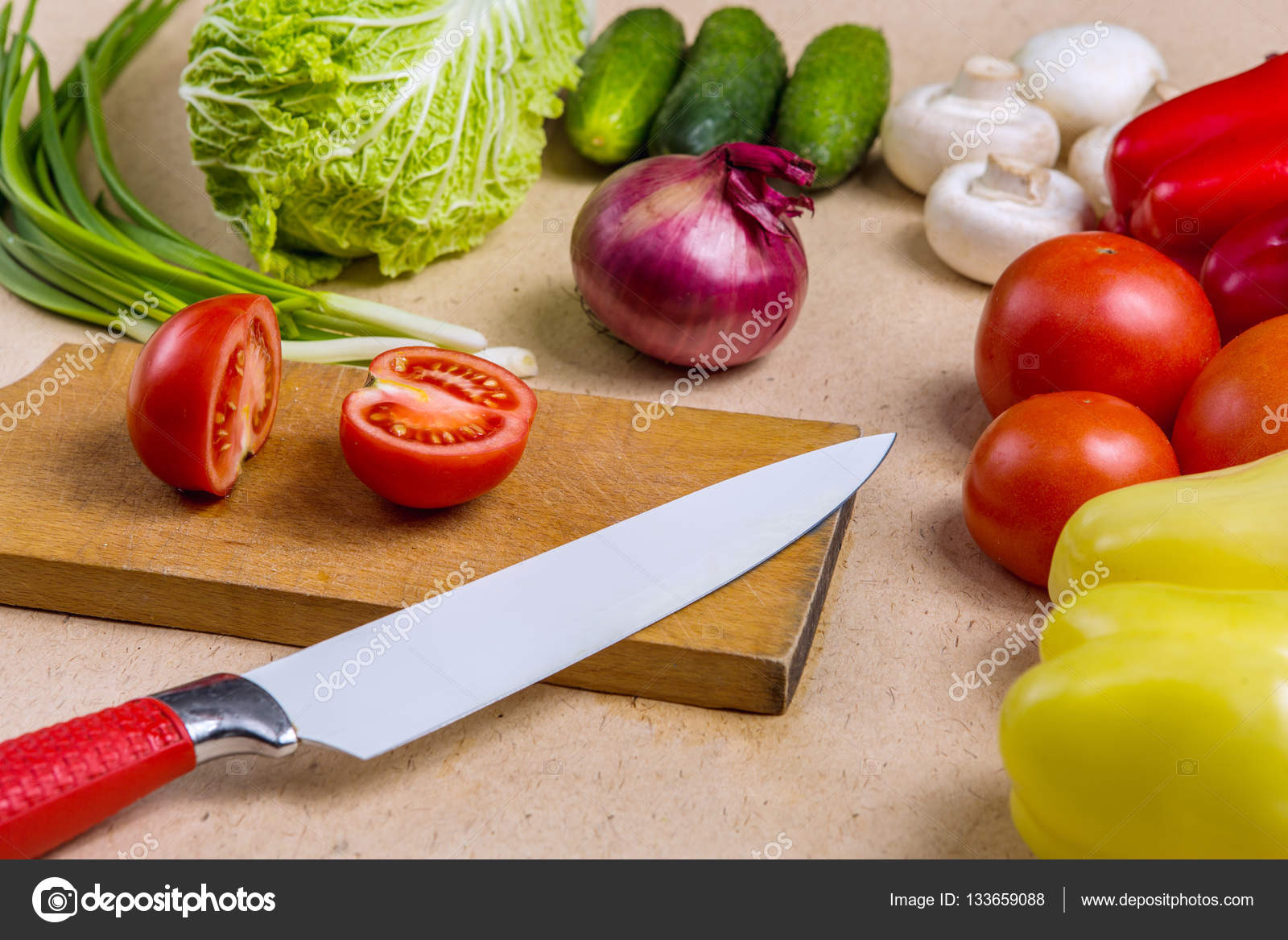 Composition of raw organic vegetabes with knife Stock Photo by ...