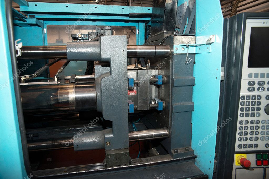 Injection molding machines in a large factory — Stock Photo © moreno ...