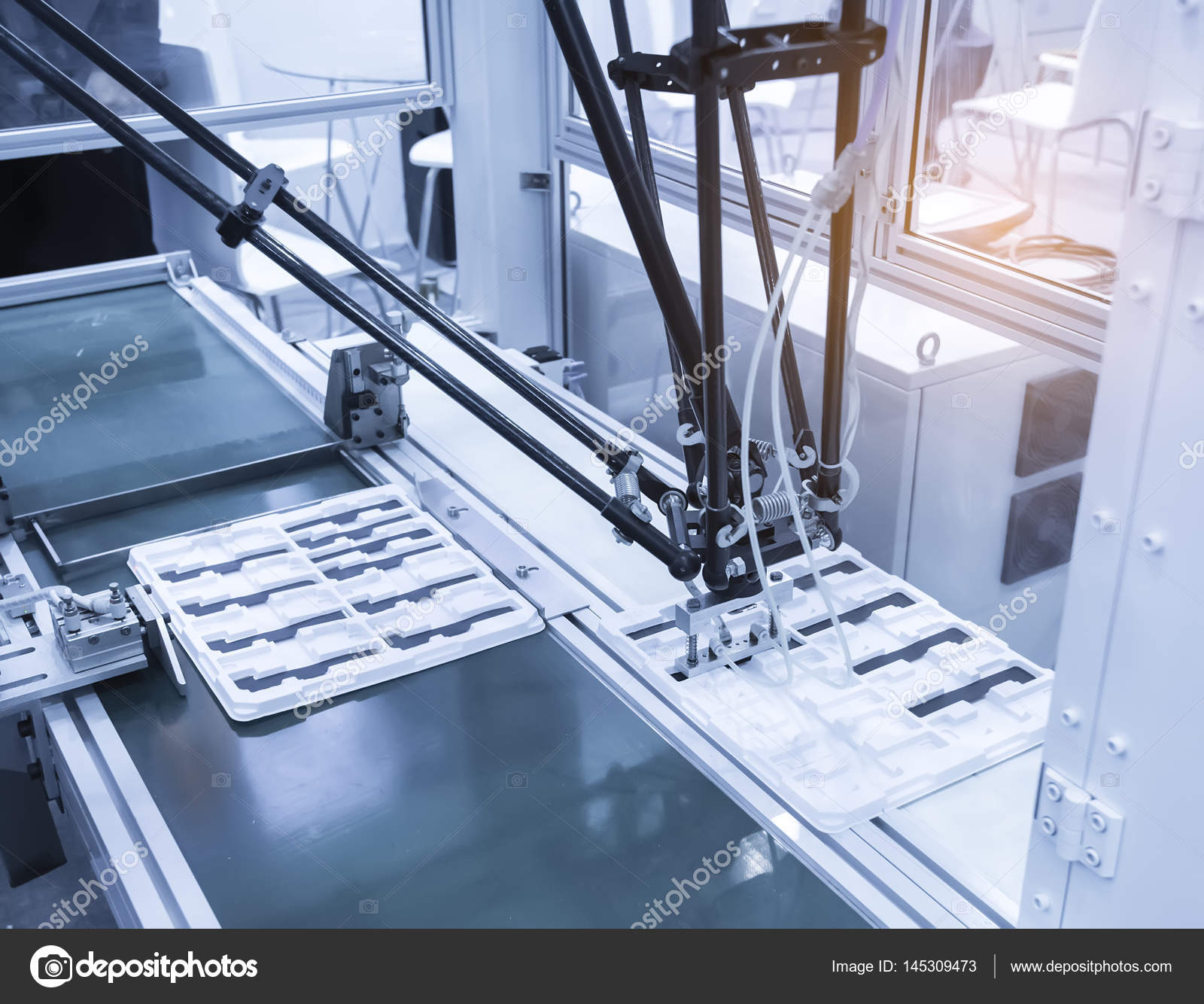 Automatic robot in assembly line working in factory. Smart facto Stock ...