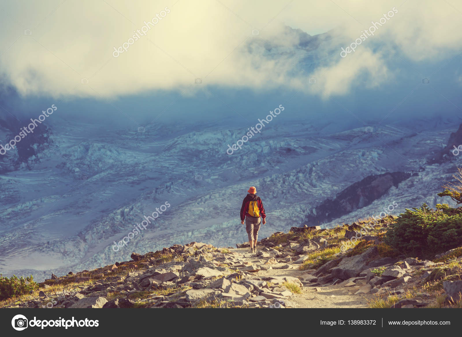 Backpacker in the summer mountains — Stock Photo © kamchatka #138983372