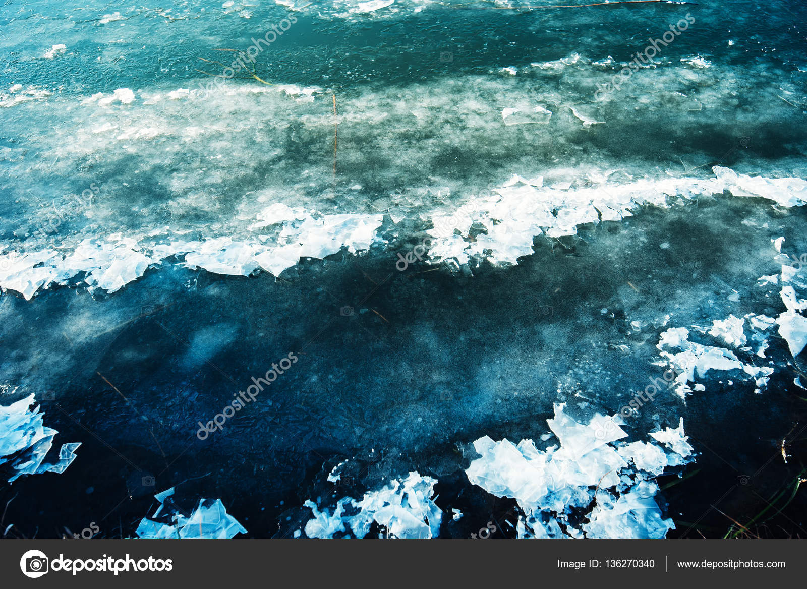 Ice on frozen river water surface Stock Photo by ©stevanovicigor 136270340