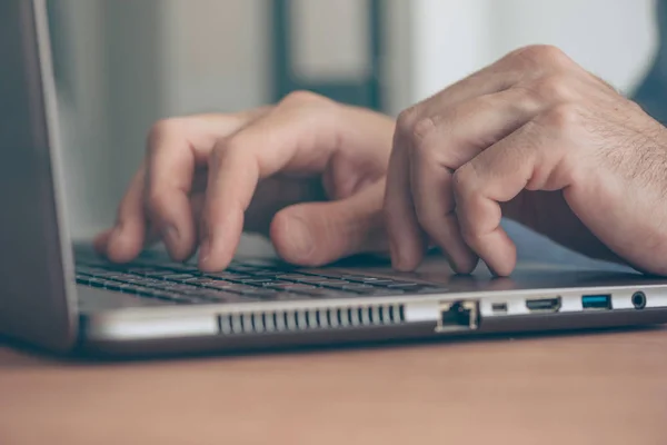 Computer programmer and hacker hands typing laptop keyboard — Stock Photo © stevanovicigor ...