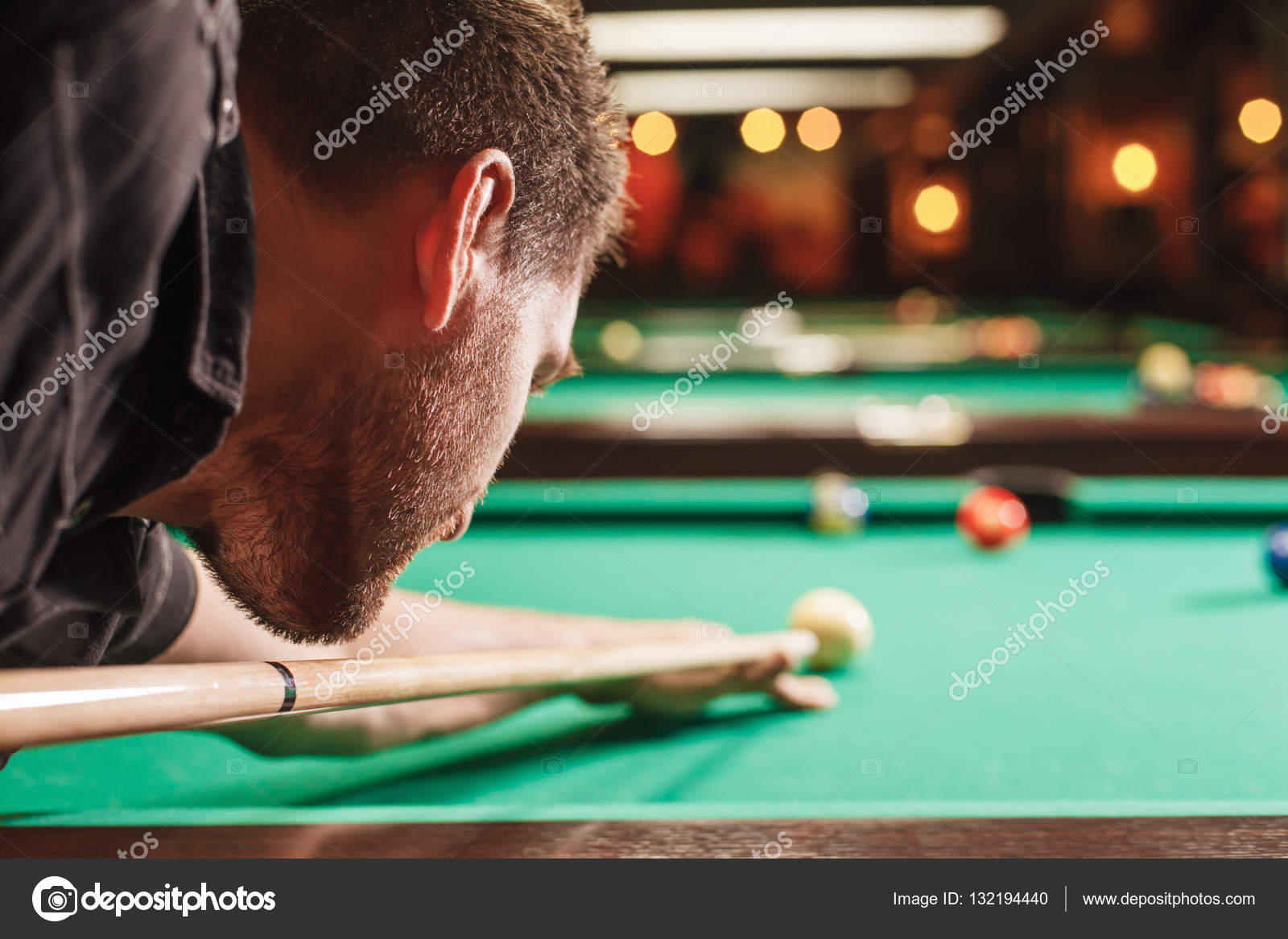 Man trying to hit ball in billiard Stock Photo by ©Nomadsoul1 132194440