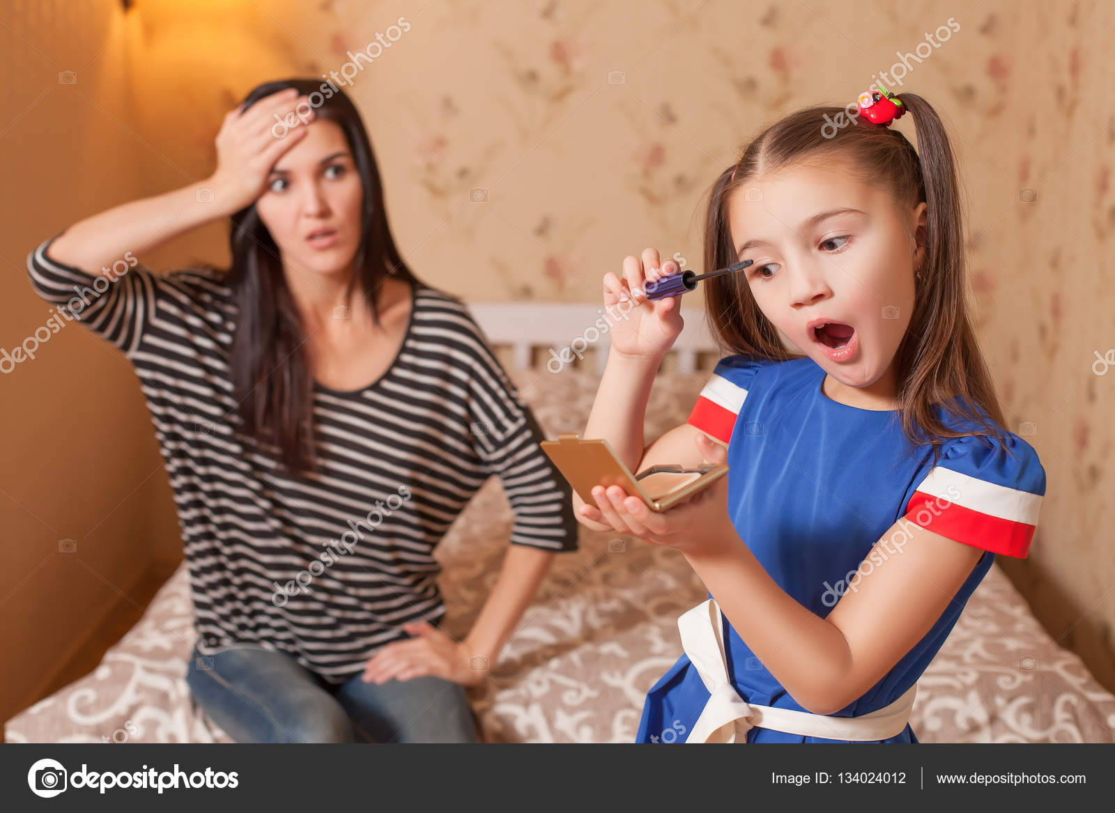 Little Girl Making Up Bed