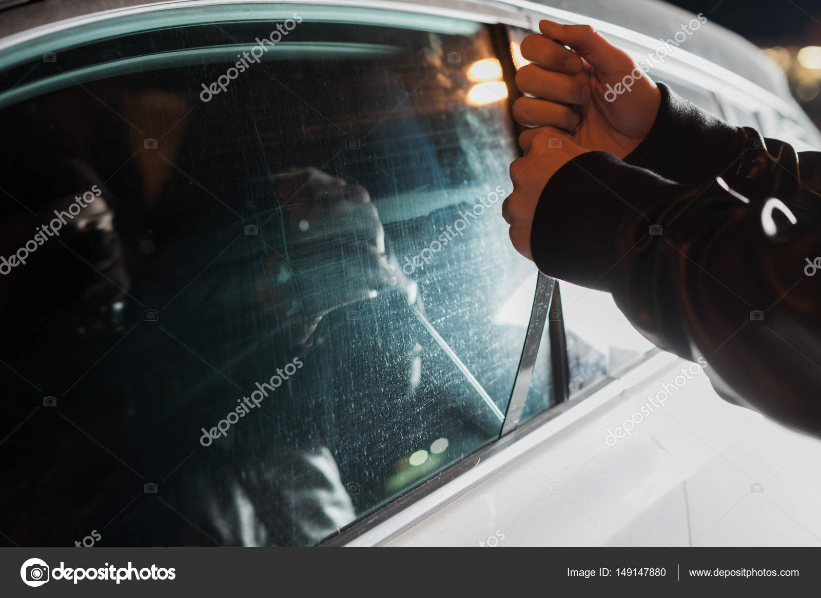 Carjacker unlocking vehicle — Stock Photo © Nomadsoul1 #149147880