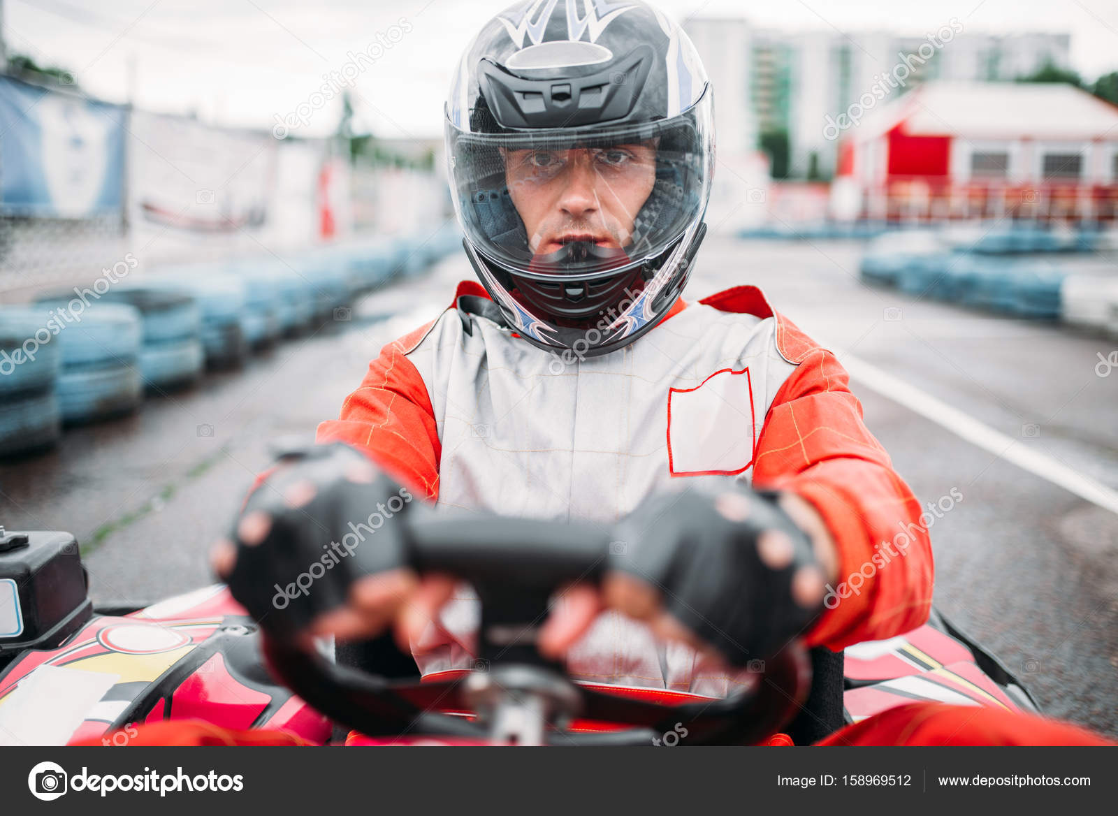 Karting racer wearing helmet Stock Photo by ©Nomadsoul1 158969512