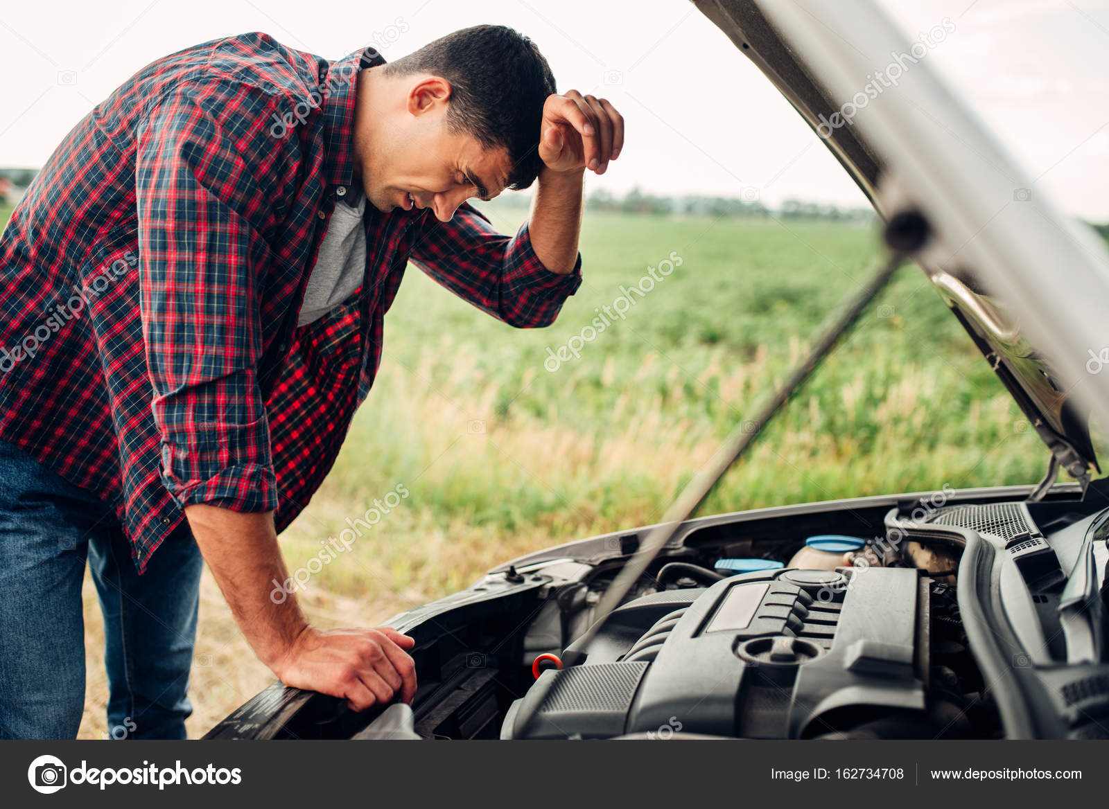 Man trying to repair broken car — Stock Photo © Nomadsoul1 #162734708