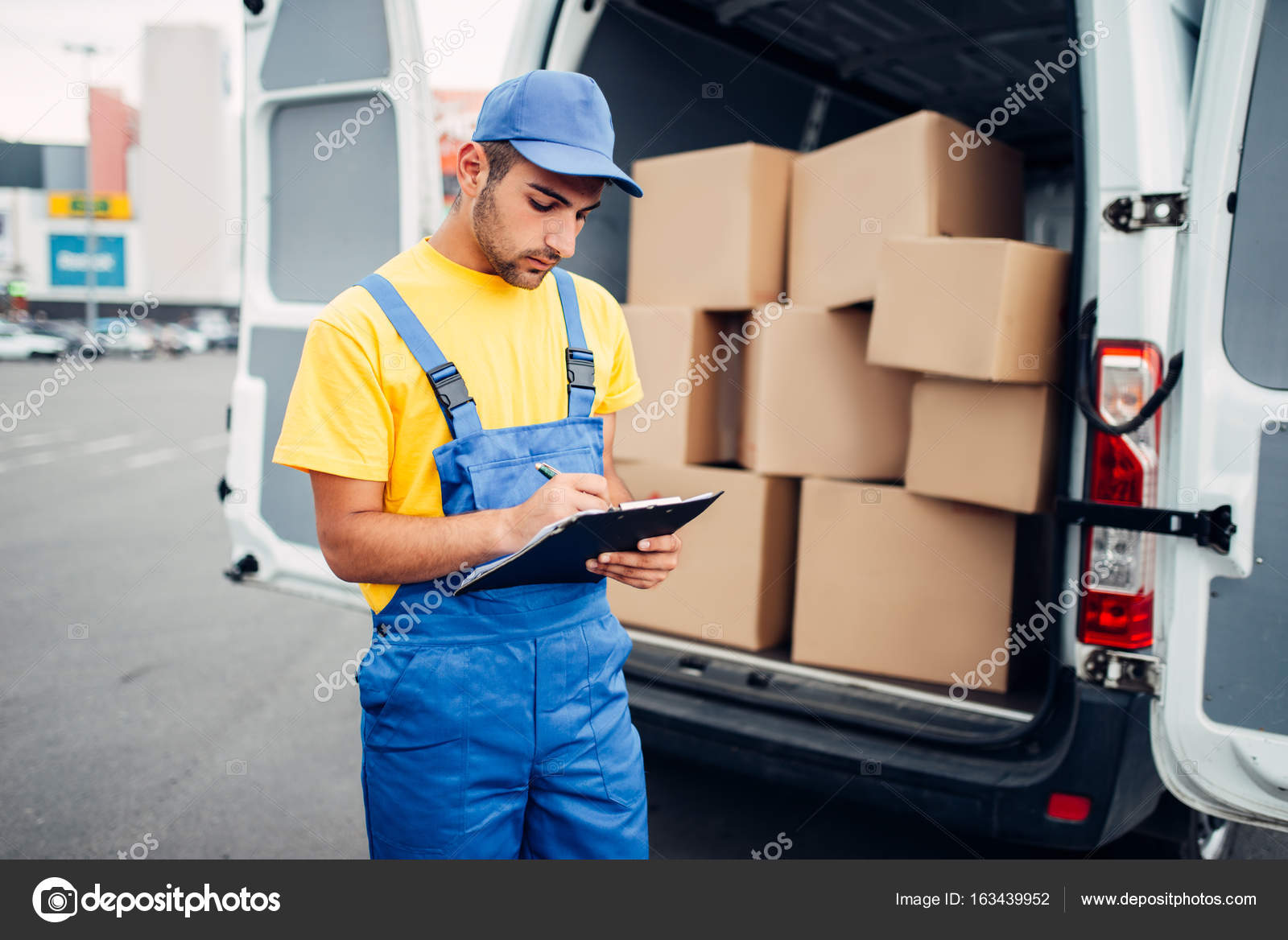 Male courier in uniform Stock Photo by ©Nomadsoul1 163439952