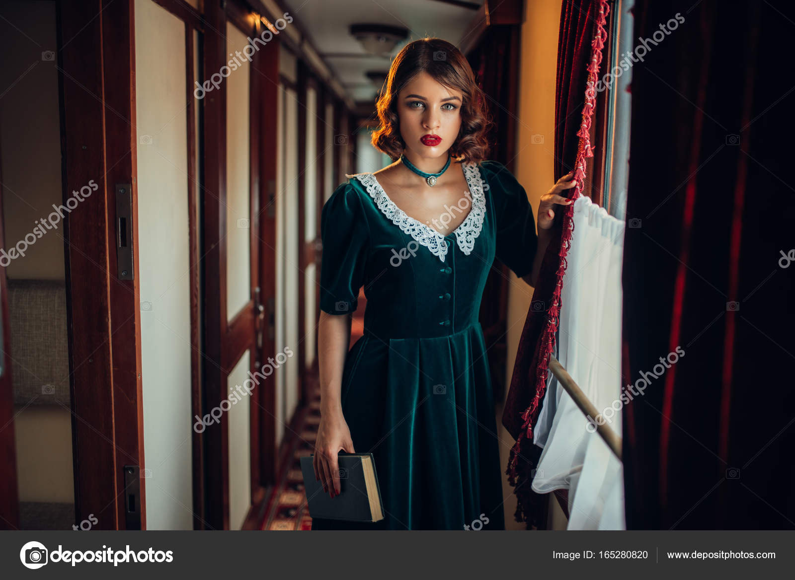Young woman travelling in retro train Stock Photo by ©Nomadsoul1 165280820
