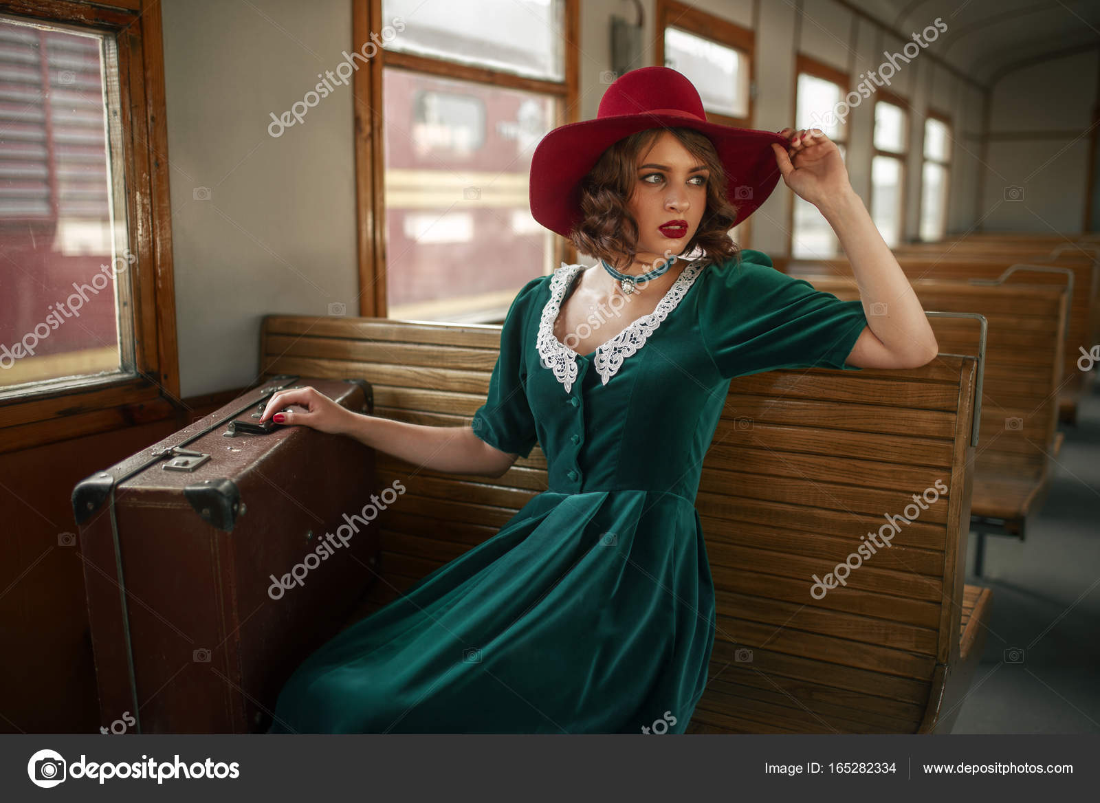 Young woman travelling in retro train Stock Photo by ©Nomadsoul1 165282334