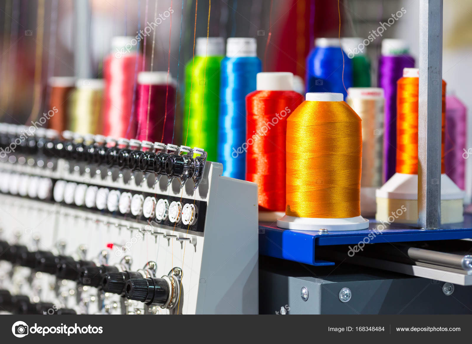 Spools of threads on spinning machine Stock Photo by ©Nomadsoul1 168348484
