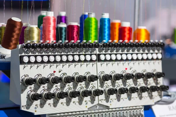 Spools of threads on spinning machine Stock Photo by ©Nomadsoul1 168348484