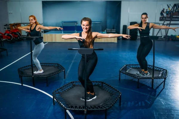 women exercising on trampolines - Stock Image - Everypixel