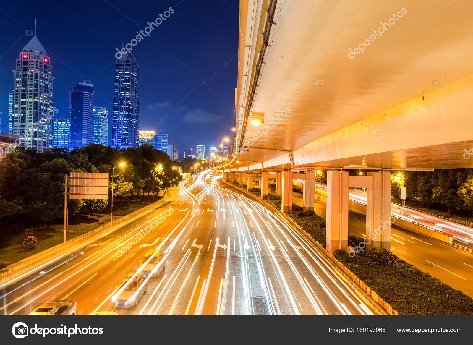 Light trails on city road Stock Photo by ©chungking 160193066