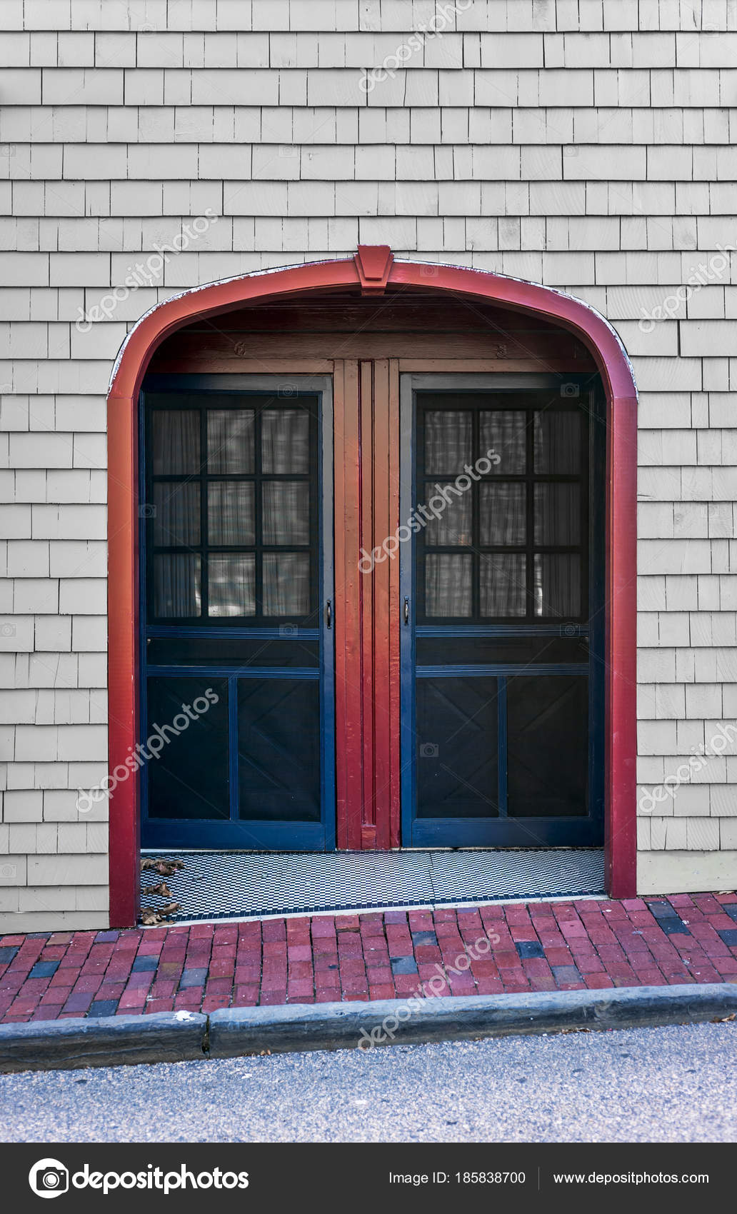 Two Doors Arched Red Opening Building — Stock Photo © j0ycem #185838700