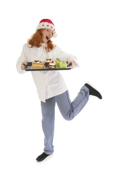 Female baker chef with hat of Santa Claus dancing with Christmas Stock ...