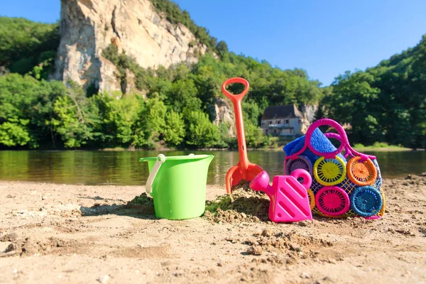 Toys near the river - Stock Image - Everypixel