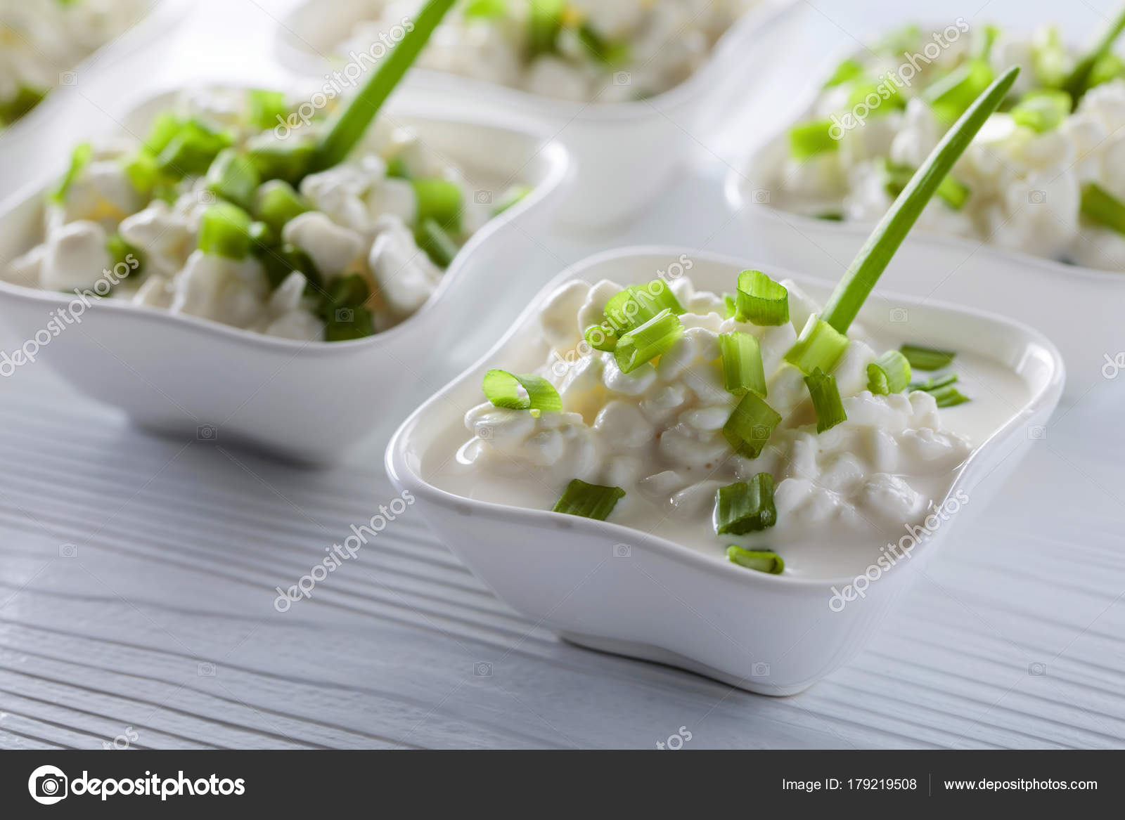 Cottage cheese with green onions. Stock Photo by ©igorr1 179219508