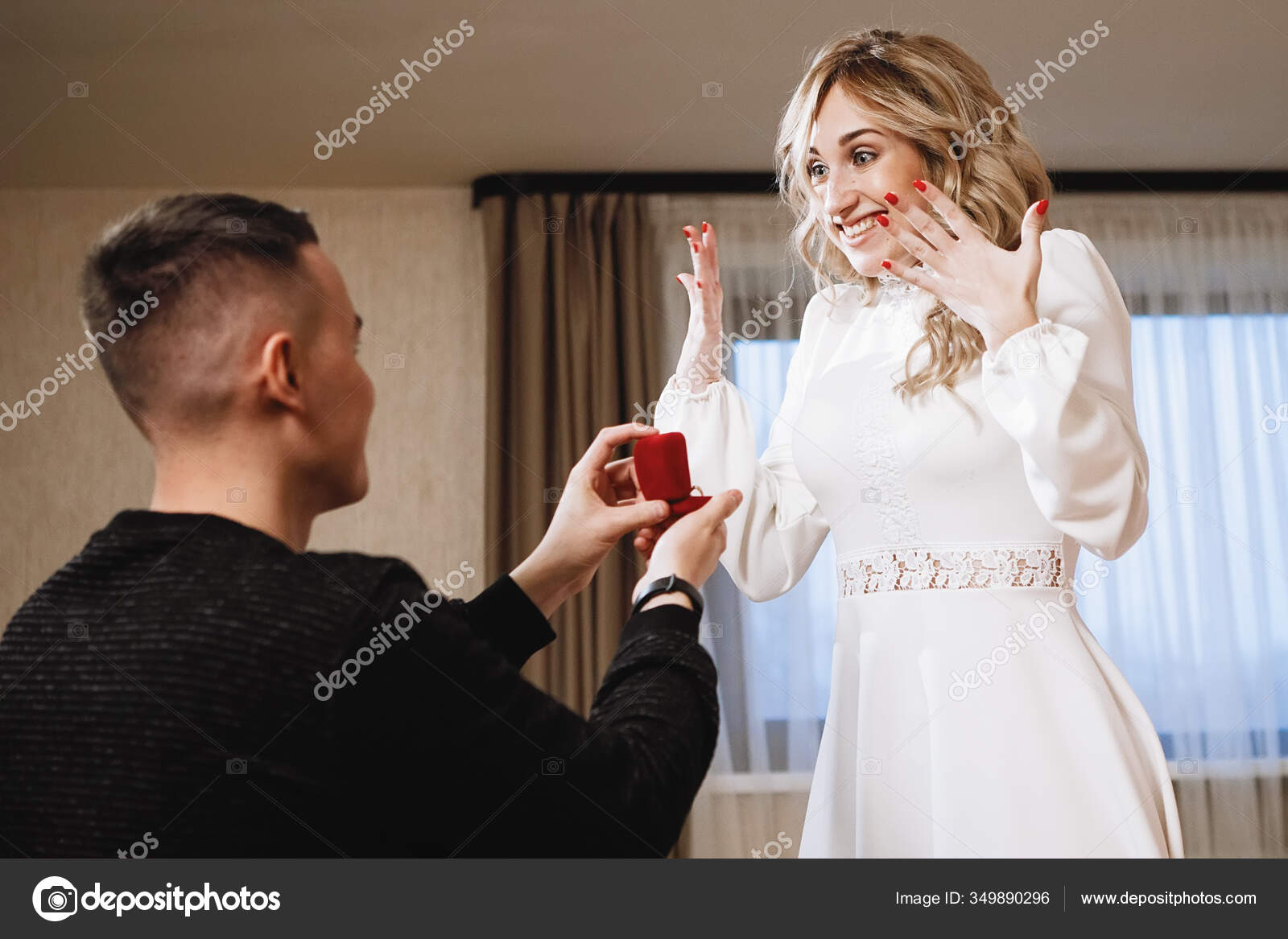 Young Man Makes Marriage Proposal Woman Engagement Surprise Delight