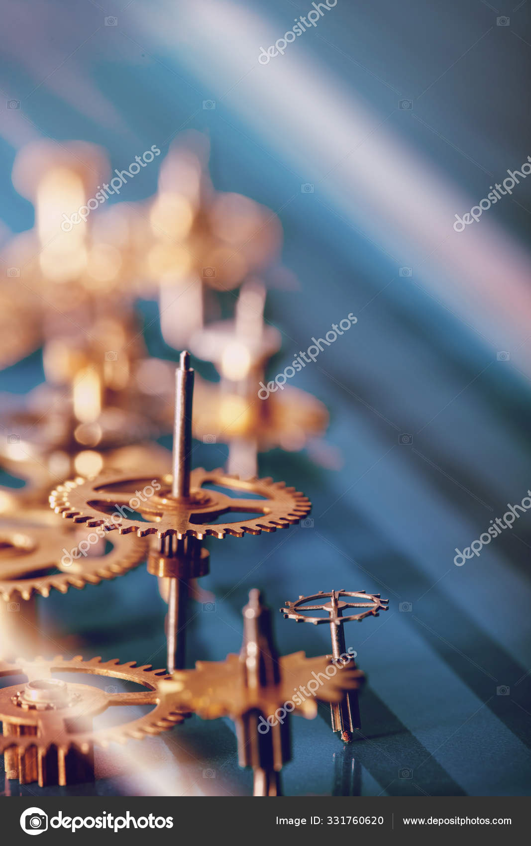 Old cogs and gears on blue background Stock Photo by ©apeyron 331760620