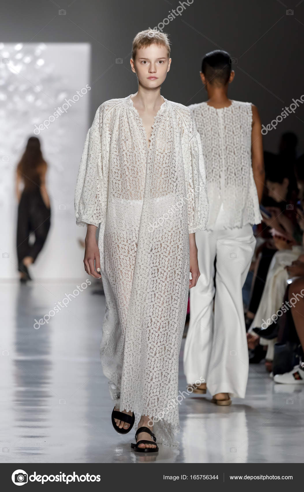 Models walk runway – Stock Editorial Photo © SamAronov #165756344