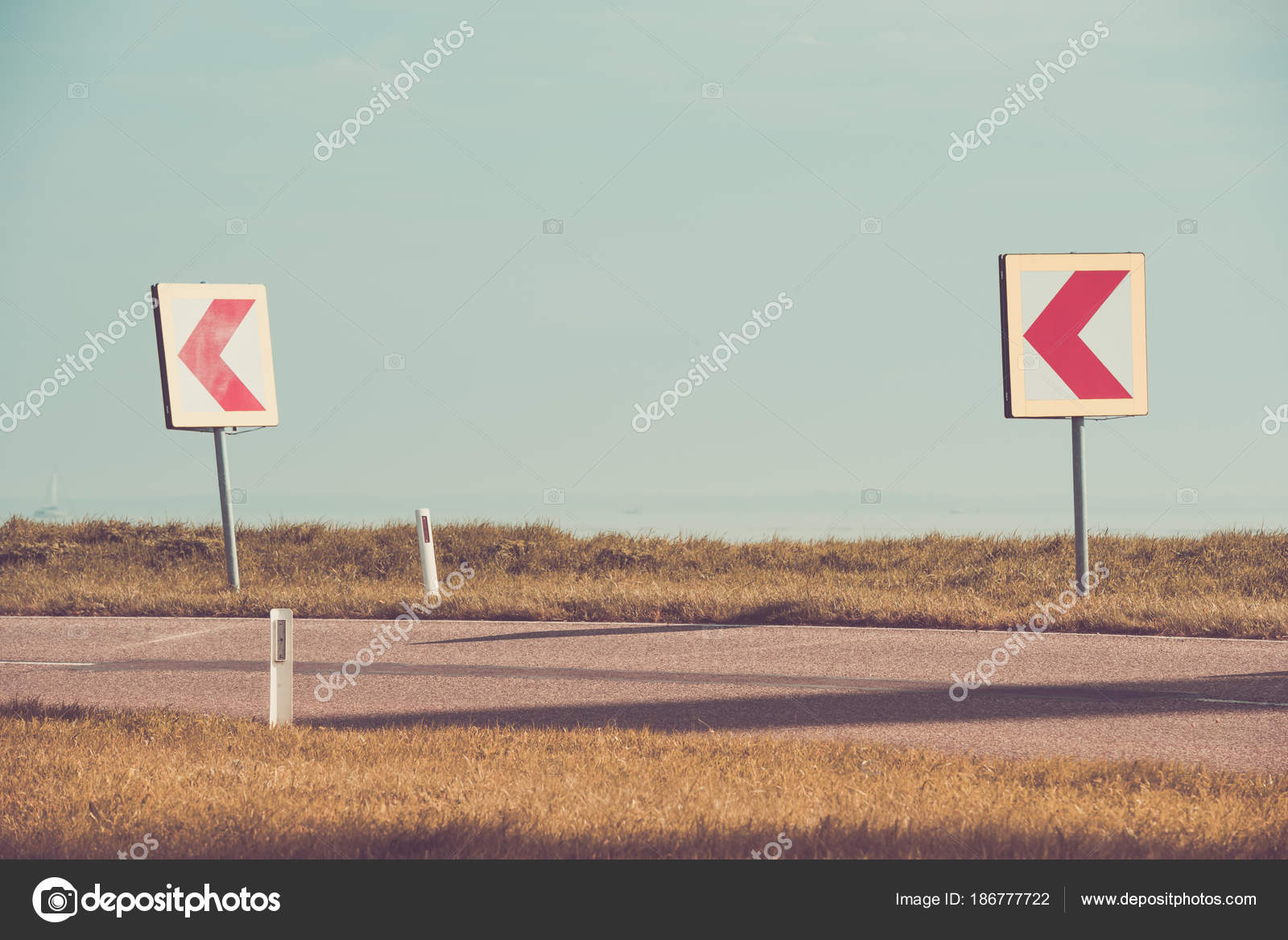 Turn left sign on a country road — Stock Photo © dvoevnore #186777722