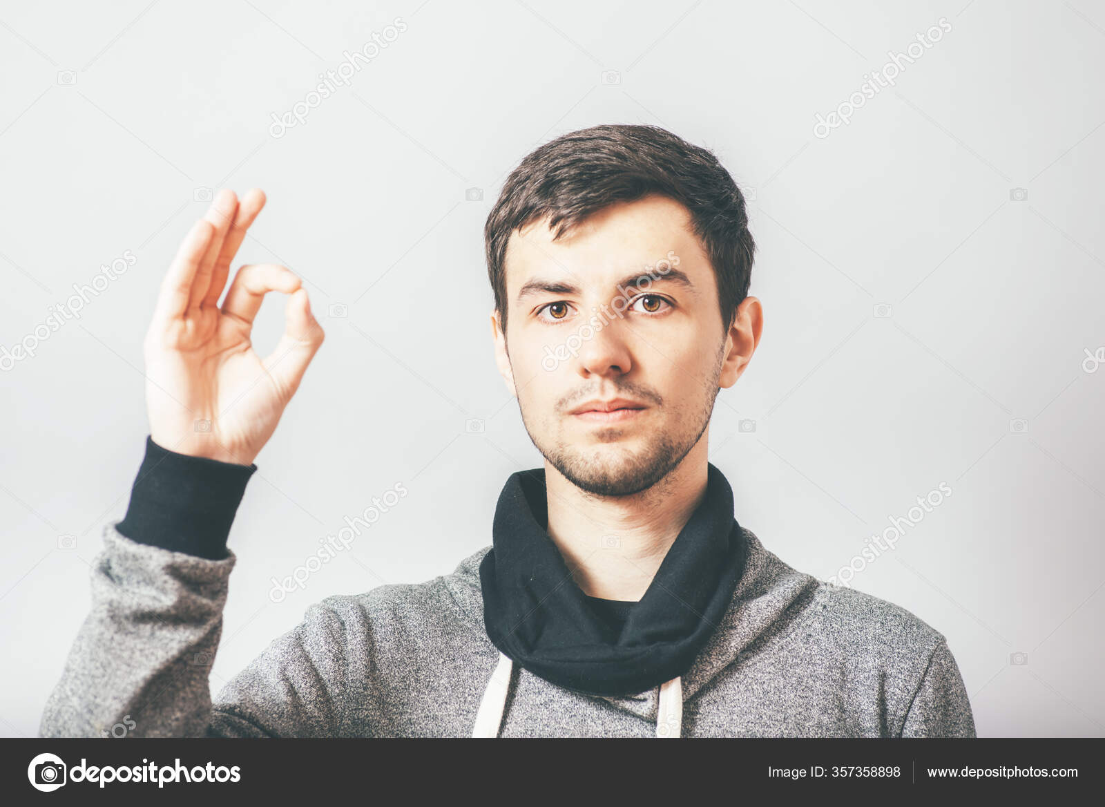 Man Conducting Photo Studio Background Stock Photo by ©file404 357358898