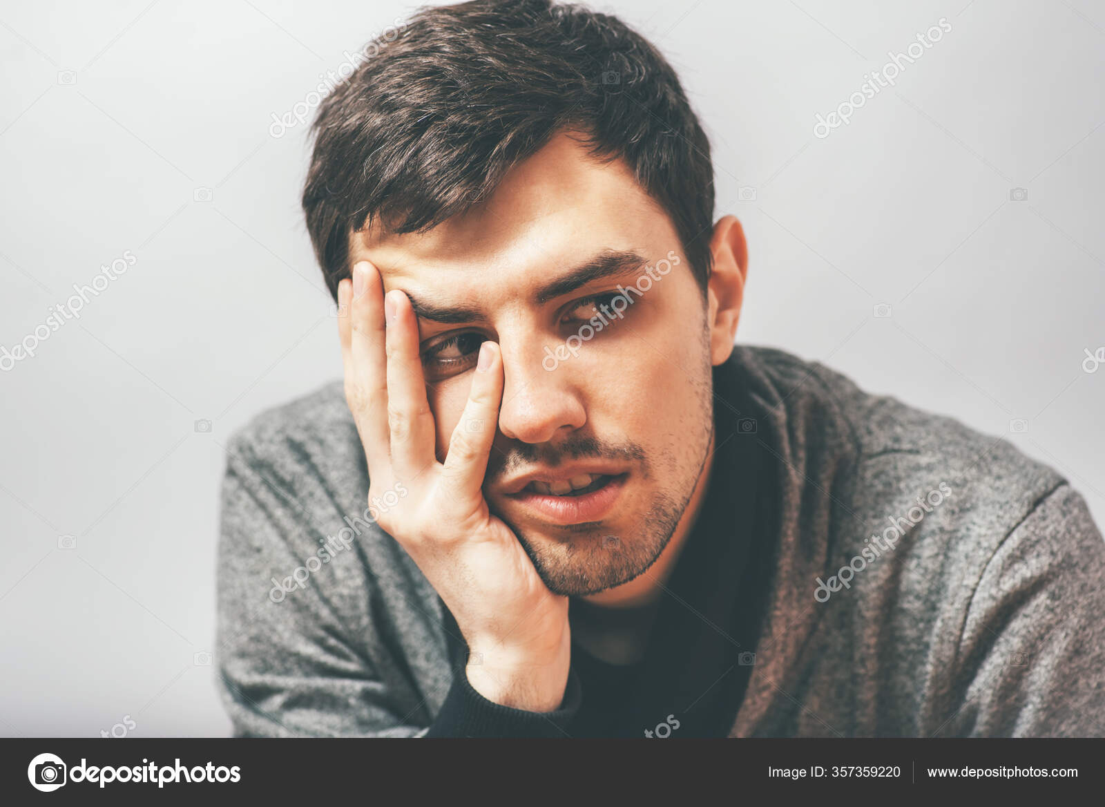 Guy Props Chin His Hand Stock Photo by ©file404 357359220