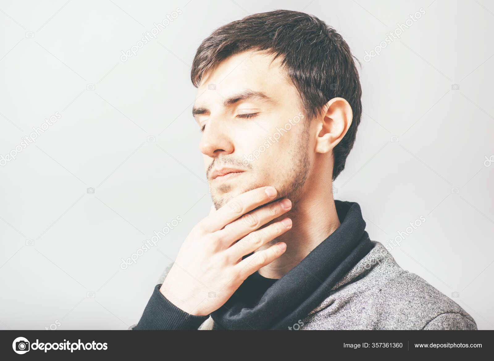 Guy Thinks Photo Studio Background Stock Photo by ©file404 357361360