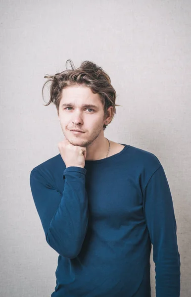 Young Man His Fist Chin — Stock Photo © file404 #357400876