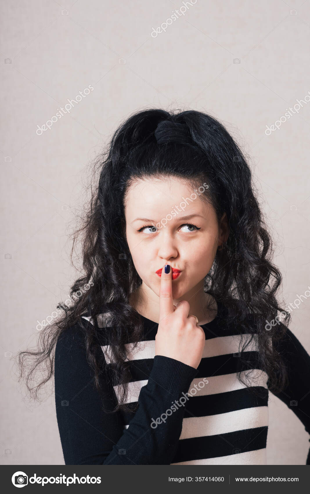 Girl Thinks Studio Background Stock Photo by ©file404 357414060