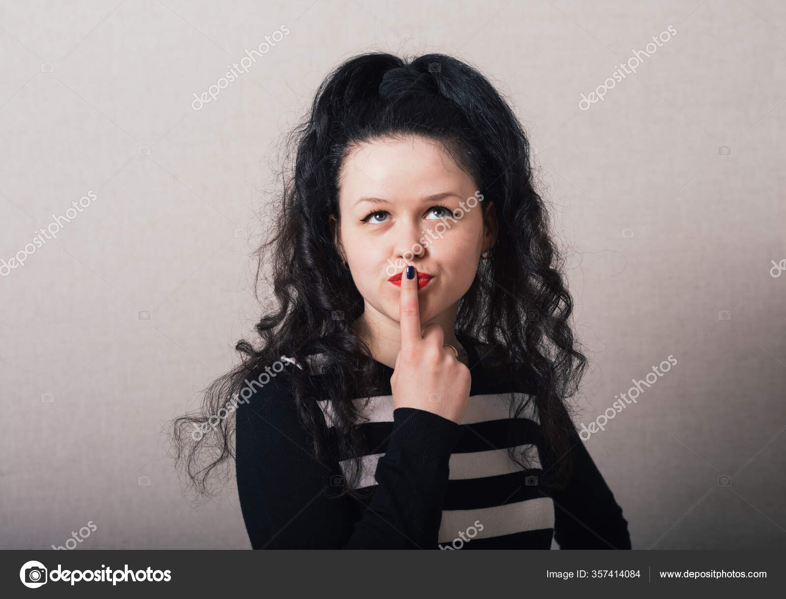 Girl Thinks Studio Background Stock Photo by ©file404 357414084