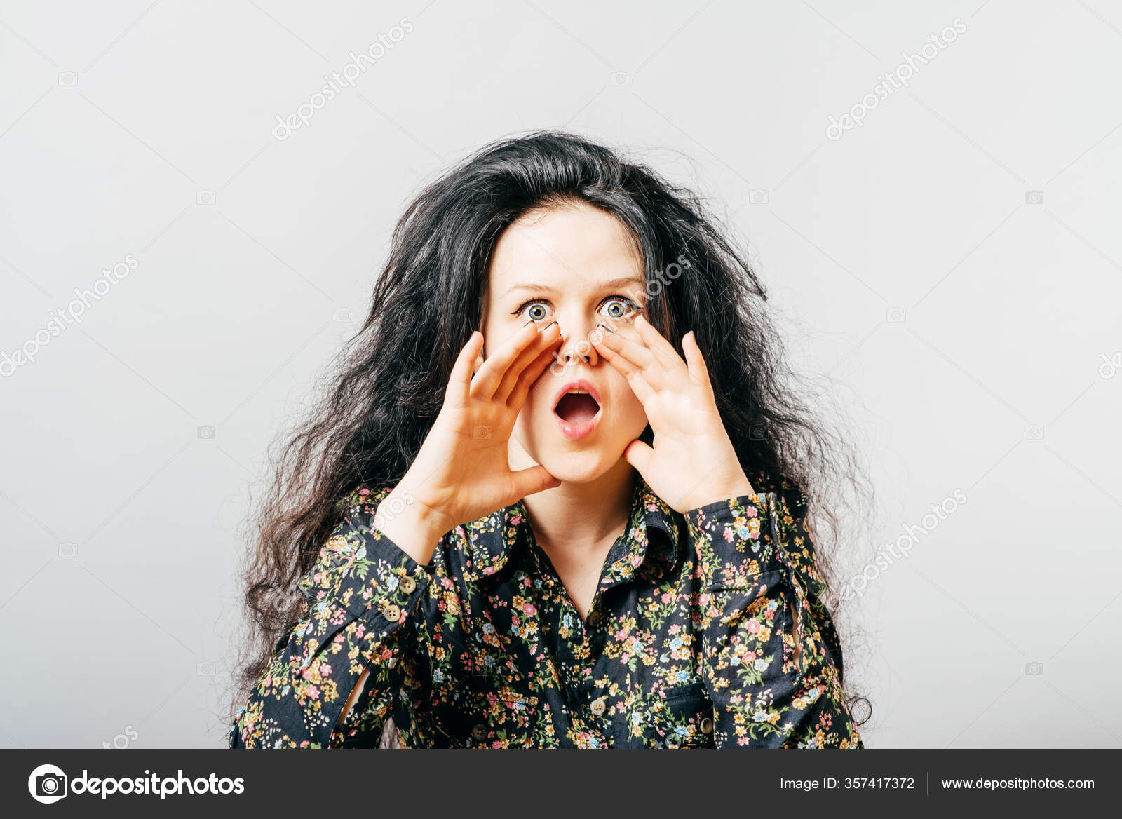 Girl Calling Someone Studio Background Stock Photo by ©file404 357417372