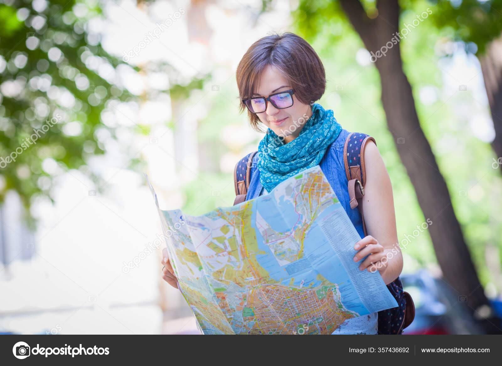 Woman Tourist Map Stock Photo by ©file404 357436692