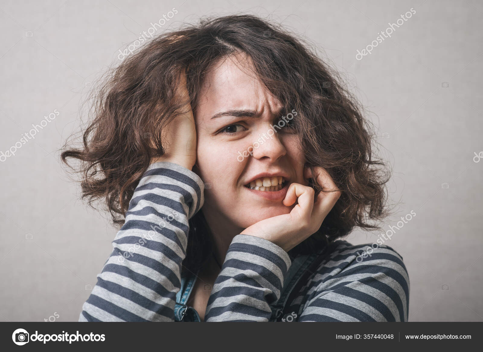 Young Woman Looking Scared Stock Photo by ©file404 357440048