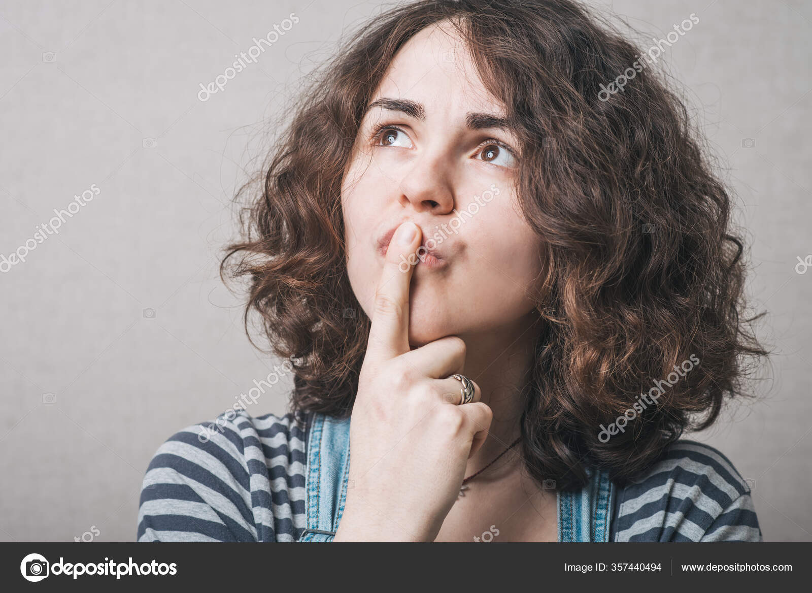 Girl Thinks Studio Background Stock Photo by ©file404 357440494