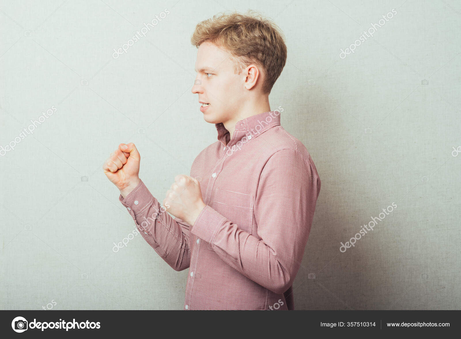 Portrait Angry Young Man Clenching His Fist — Stock Photo © file404 ...
