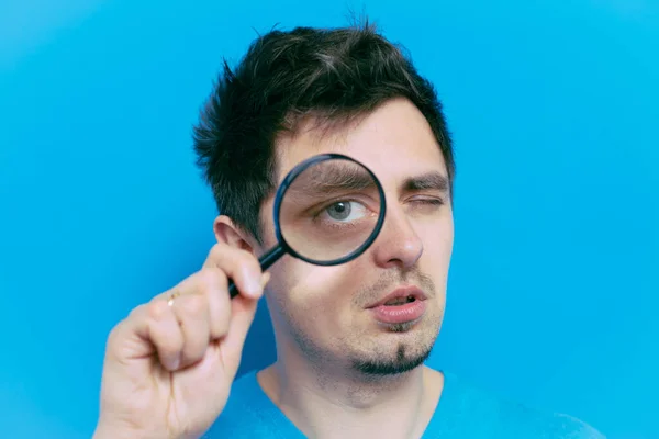 Man with a magnifier Stock Photos, Royalty Free Man with a magnifier ...