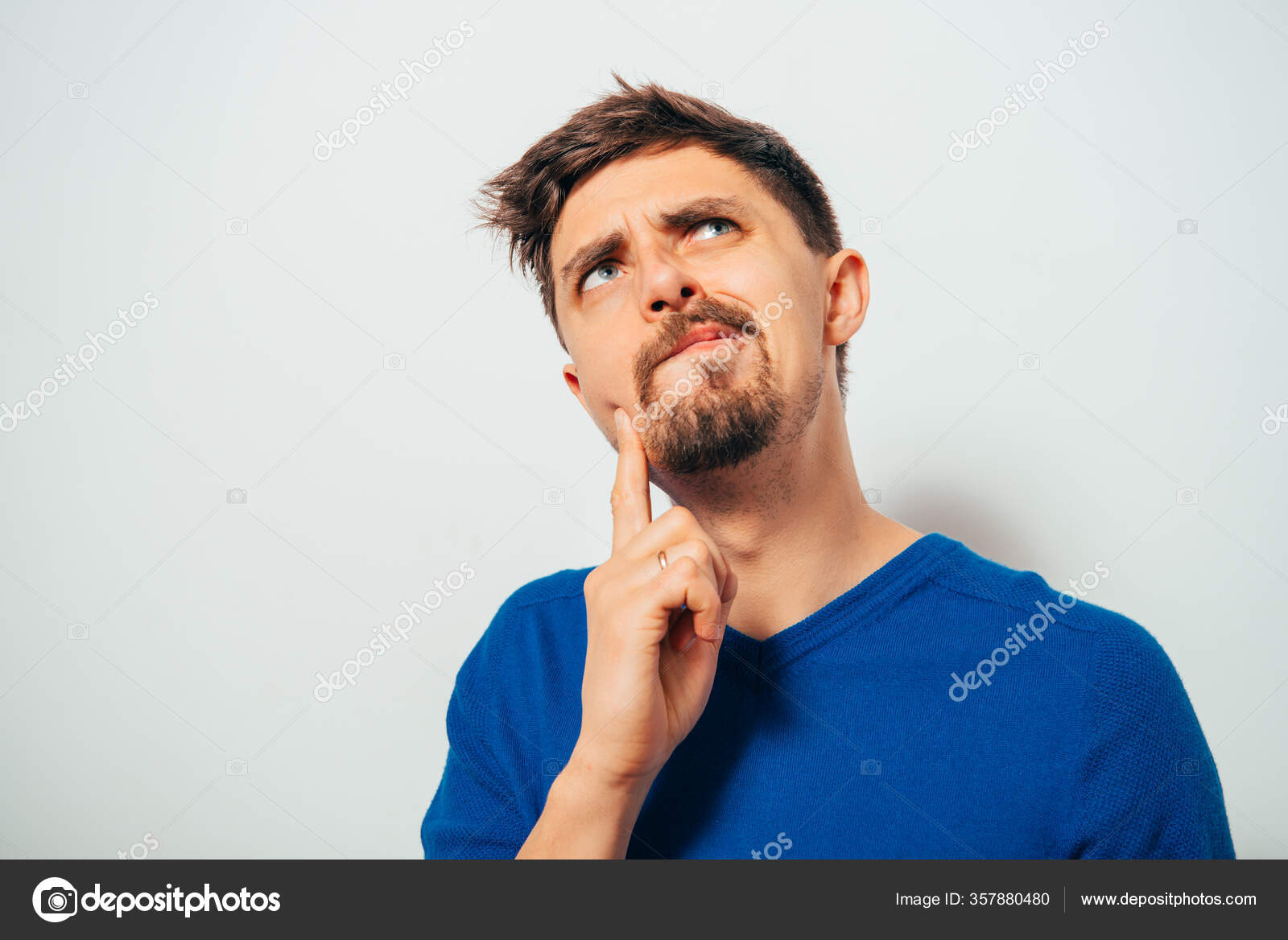 Man Thinks Studio Background Stock Photo by ©file404 357880480