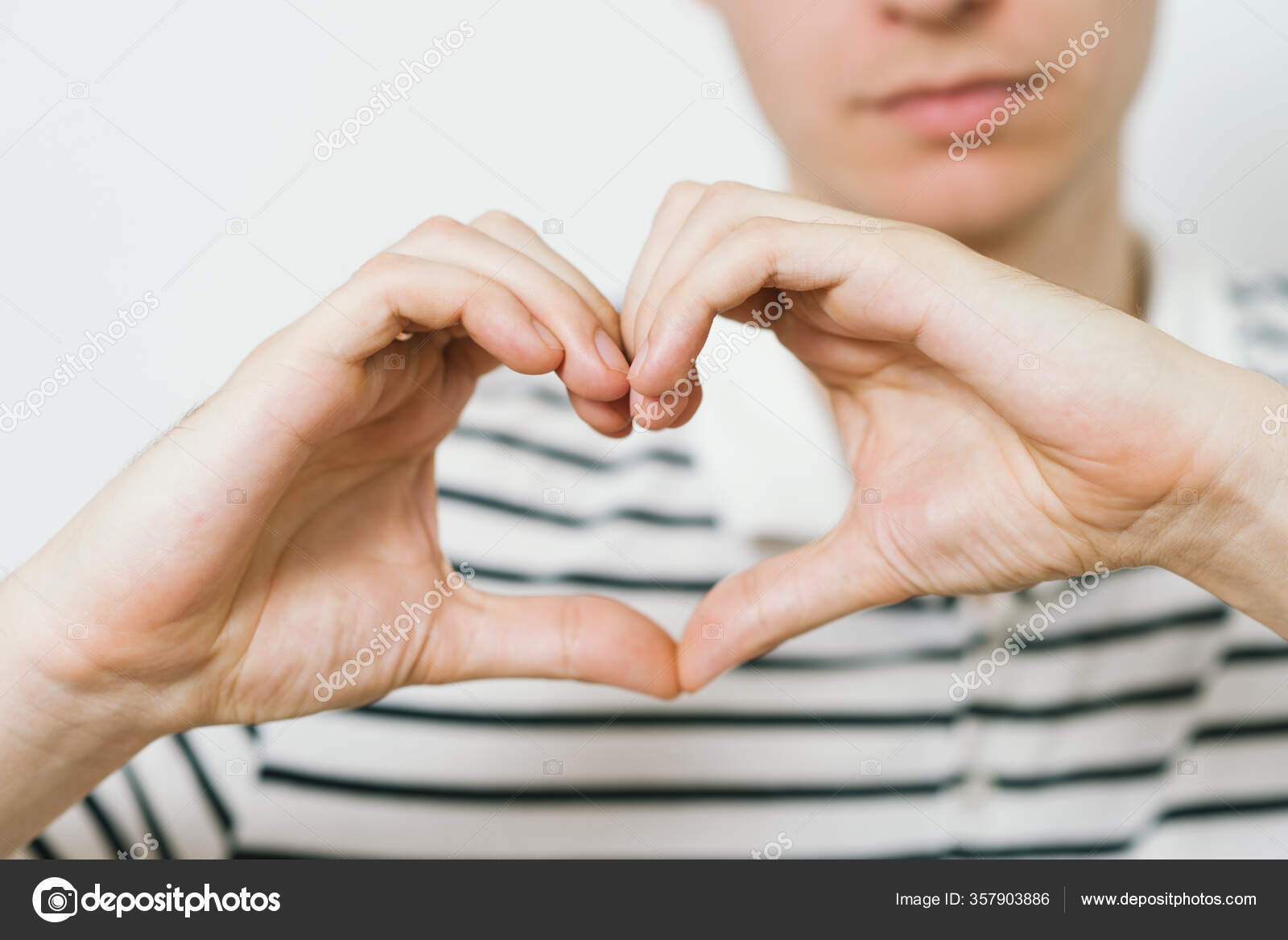 Man Making Hand Heart Frame Stock Photo by ©file404 357903886