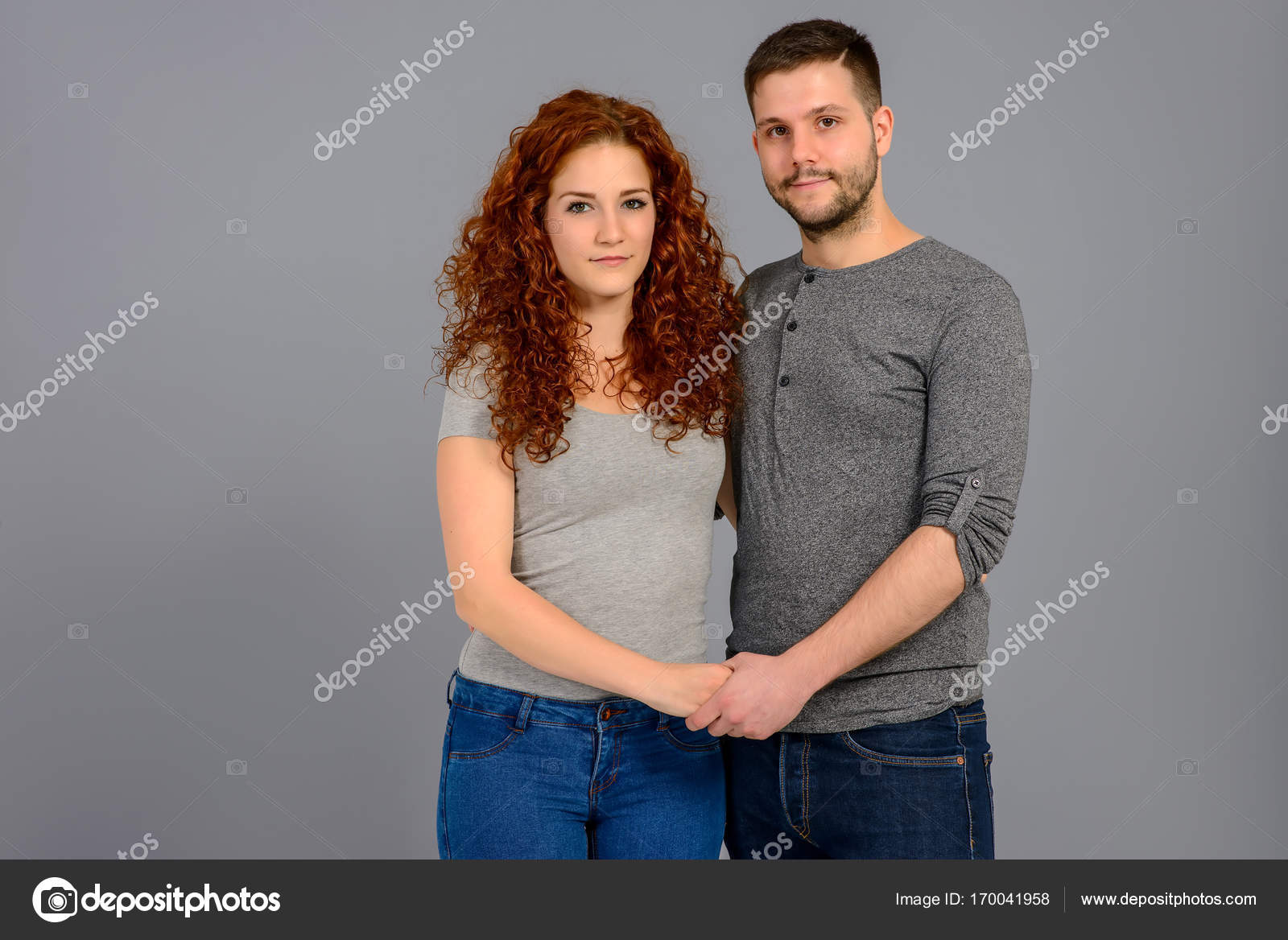 Nice young couple in the studio — Stock Photo © Spectral #170041958