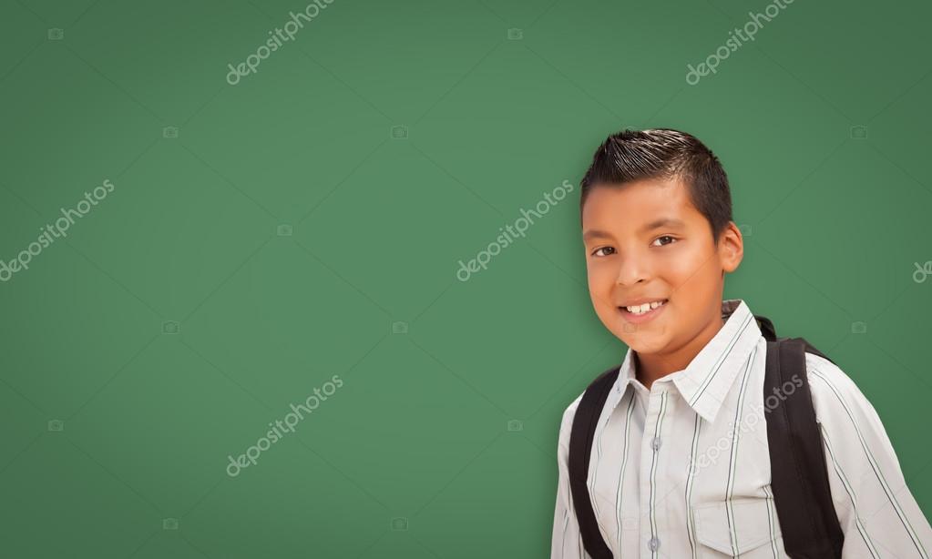 Cute Hispanic Boy In Front of Blank Chalk Board — Stock Photo ...