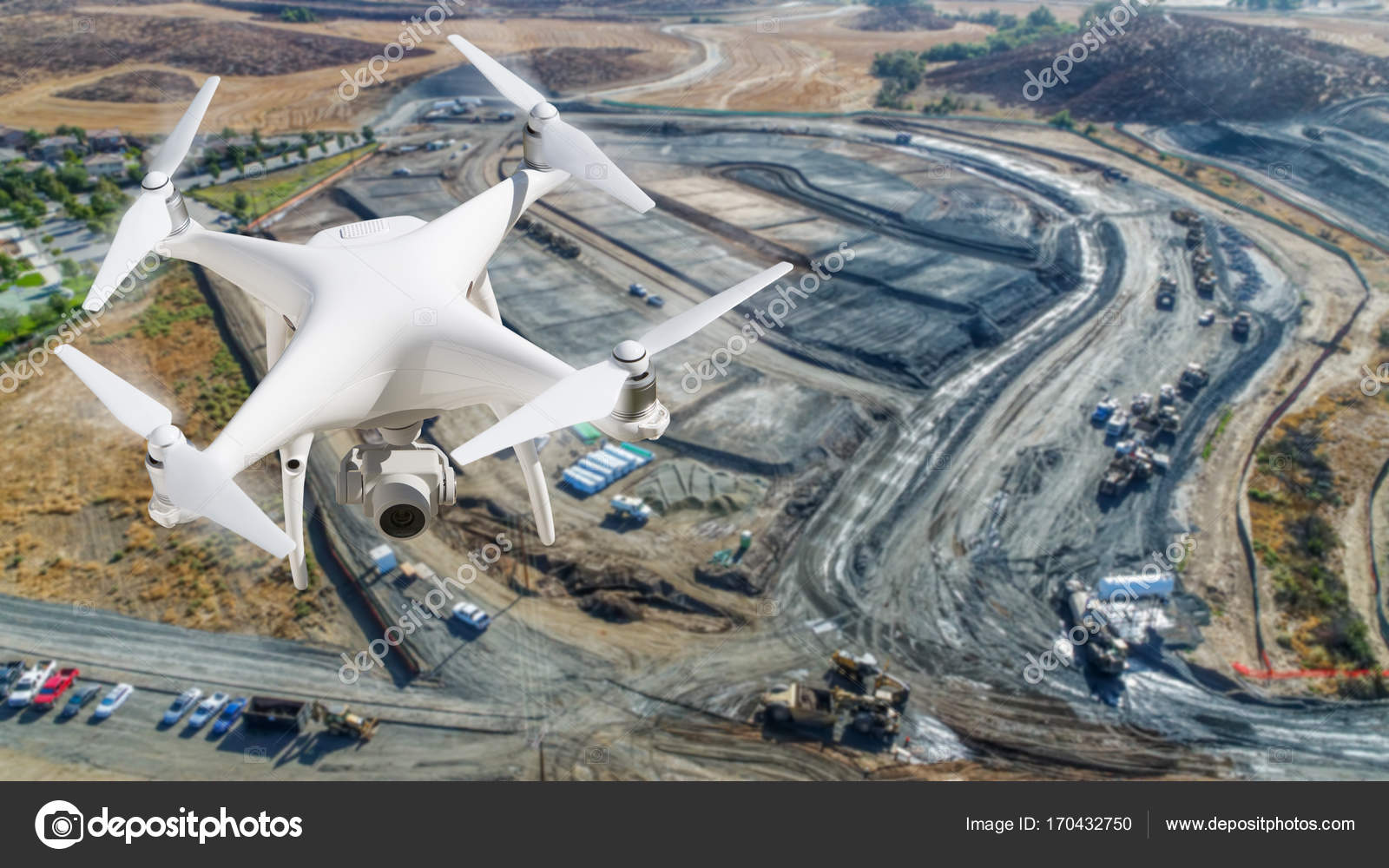 Unmanned Aircraft System (UAV) Quadcopter Drone In The Air Over Stock ...